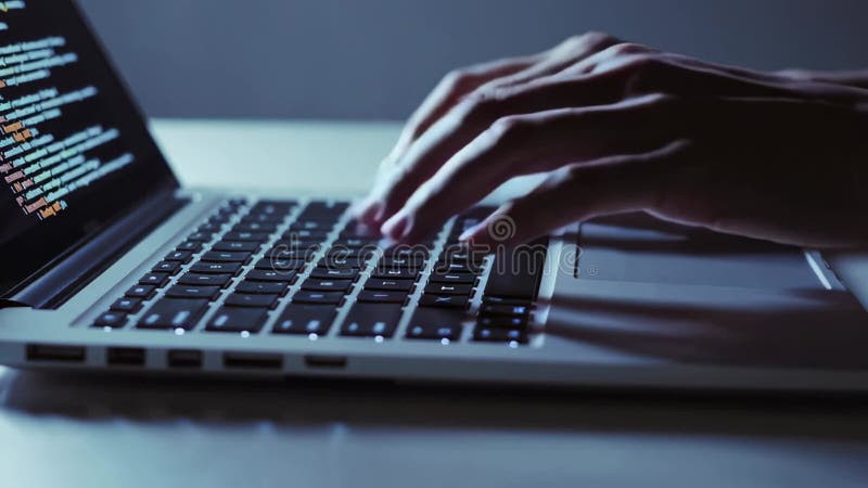 Programmer Writing Code on Laptop Keyboard in Office at Night Stock Footage - Video of database ...