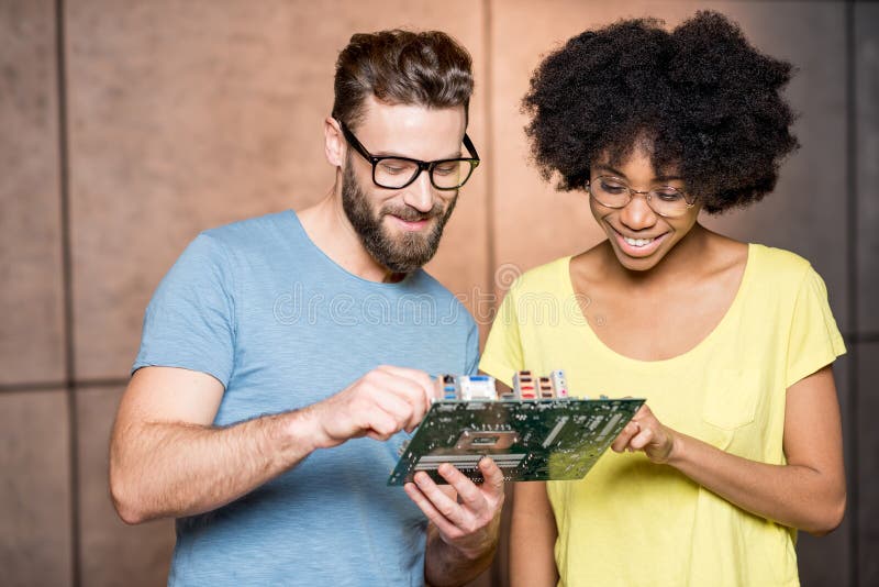 Programmers Dressed Casually Together with Computer Stock Image - Image ...