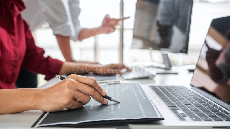 Programmers Cooperating At Developing Programming And Website Working In A Software Develop