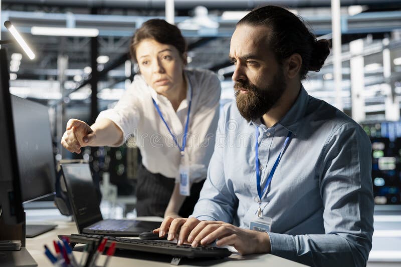 Programmers in Data Center Workplace Using Computer, Verifying Firewall Stock Image - Image of ...