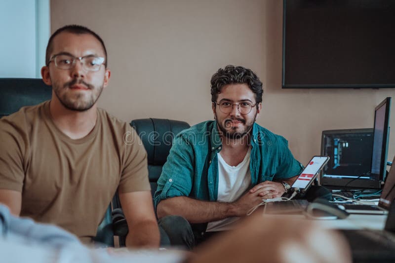 Programmers Engrossed in Deep Collaboration, Diligently Working ... Programmers Engrossed in Deep Collaboration, Diligently Working ...