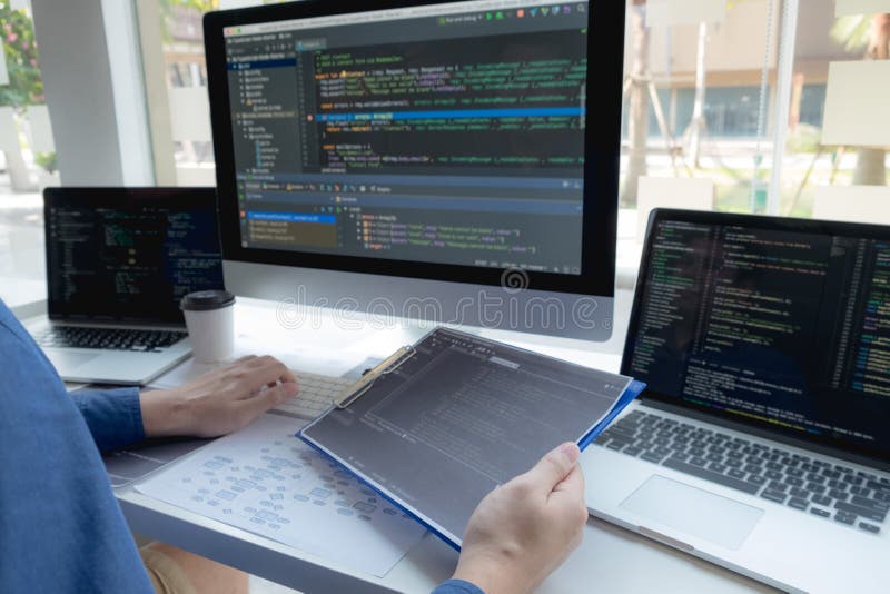 Programmers Work on the Development of Coding and Coding Technology on ...