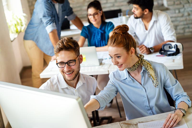 Programmers Working in a Software Developing Company Office. Business ... Programmers Working in a Software Developing Company Office. Business ...