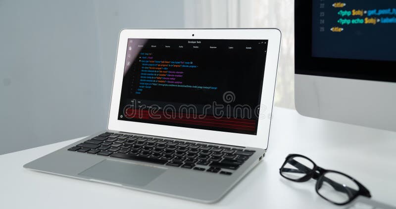 Programming Code on Laptop Monitor and beside Screen Pc Desktop ...