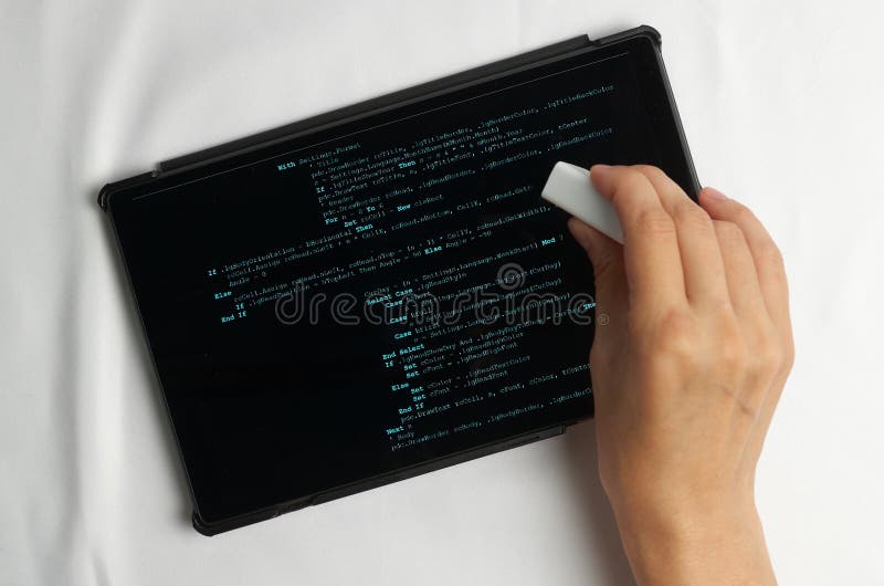 Programming and Coding Concept. Program Code Creation: Hand with Eraser Erases Erroneous Part of ...