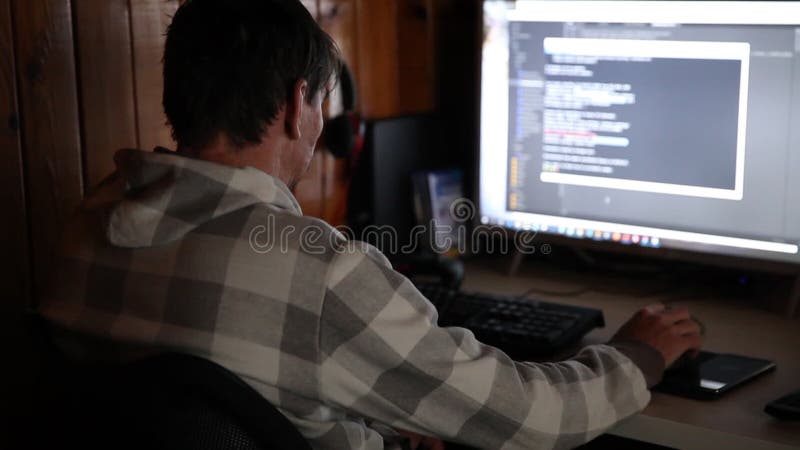 Programming Concept Man Programmer Working On Computer At Home Coding On Screen Writing Code