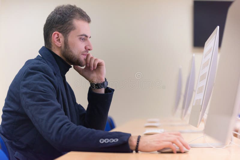 Programming. Man Working on Computer in it Office, Sitting at Desk Writing Codes. Programmer ...