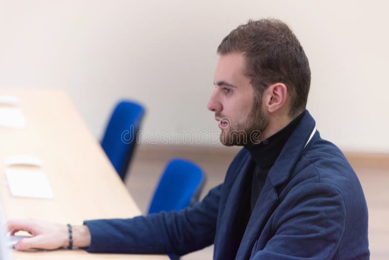 Programming. Man Working on Computer in it Office, Sitting at Desk ...