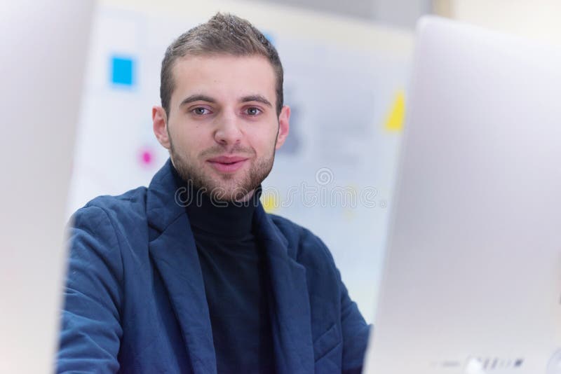 Programming. Man Working on Computer in it Office, Sitting at Desk Writing Codes Stock Photo ...