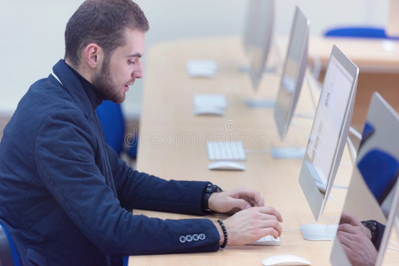 Programming. Man Working on Computer in it Office, Sitting at Desk ...