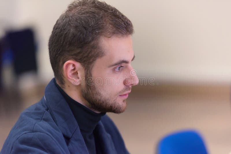 Programming Man Working On Computer In It Office Sitting At Desk