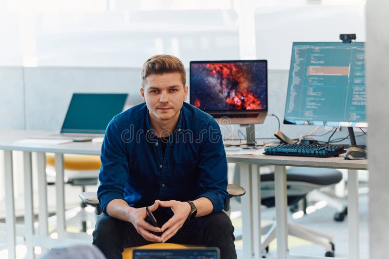 Programming. Man Working on Computer in it Office, Sitting at Desk ...