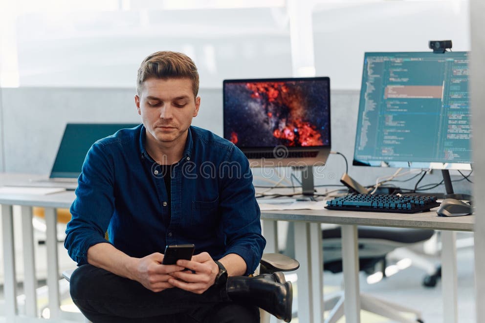 Programming. Man Working on Computer in it Office, Sitting at Desk ...