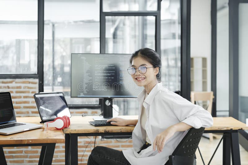 Young Programmer Working on Desktop PC in Office of Software Company. Stock Photo - Image of ...