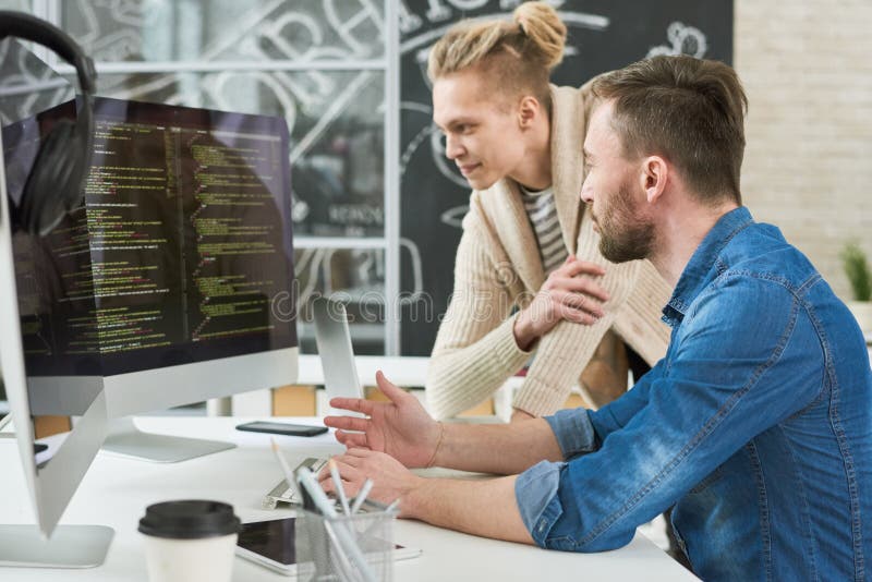 Programming Team Working on New Software Stock Photo - Image of businessman, workplace: 115071286