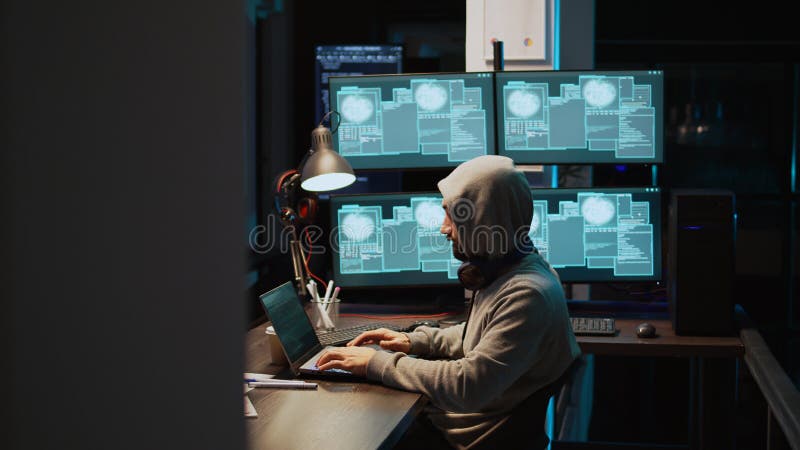 Masked Cyber Thief Hacking Computer Network at Night Stock Photo ... Masked Cyber Thief Hacking Computer Network at Night Stock Photo ...
