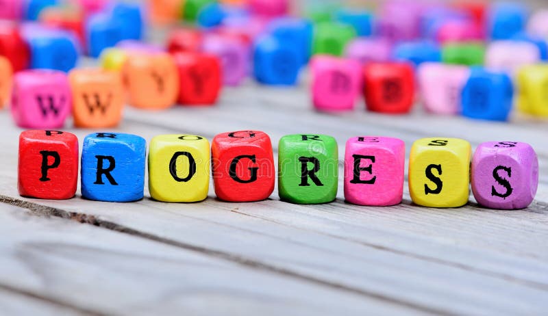 Progress Word on Wooden Table Stock Photo - Image of development ...