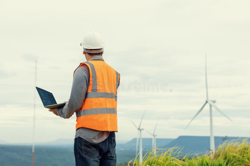 Progressive Concept of Engineer Working in the Wind Farm Atop of the ...