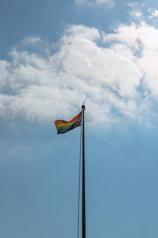 Progressive Pride Flag Flying on a Pole Stock Photo - Image of stripes ...