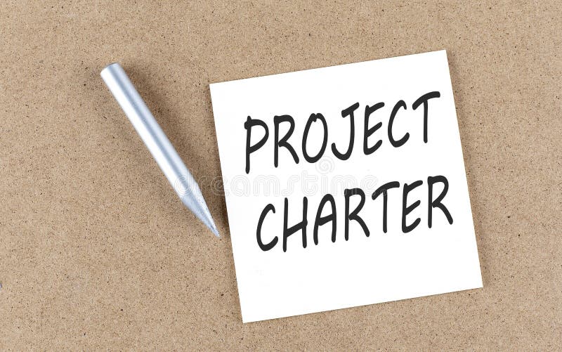 PROJECT CHARTER Text on Sticky Note on a Cork Board with Pencil Stock ...