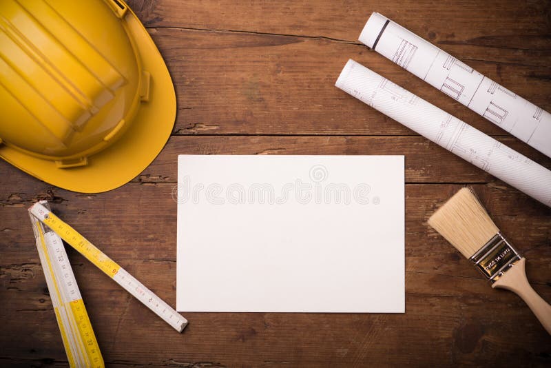 Project Construction Blueprints and Engineering Tools on Wooden Desk ...