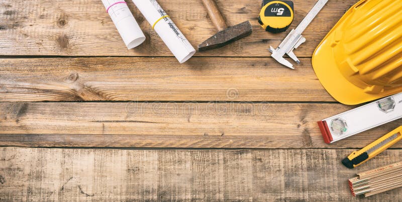 Project Construction Blueprints and Engineering Tools on Wooden Desk ...