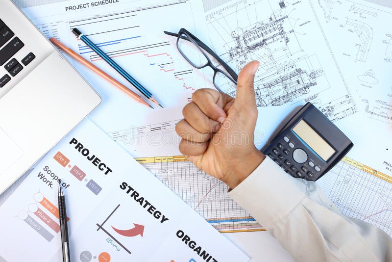 Project Documents on a Desk with Thumb Up, Schedule, Drawing and Gantt ...