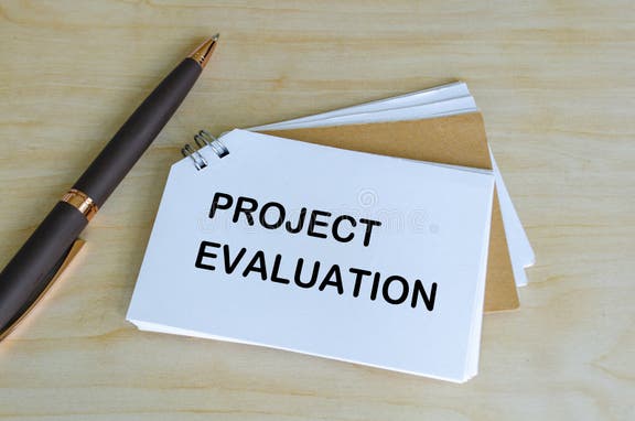 Project Evaluation Text on White Notepad. Project Planning and ...