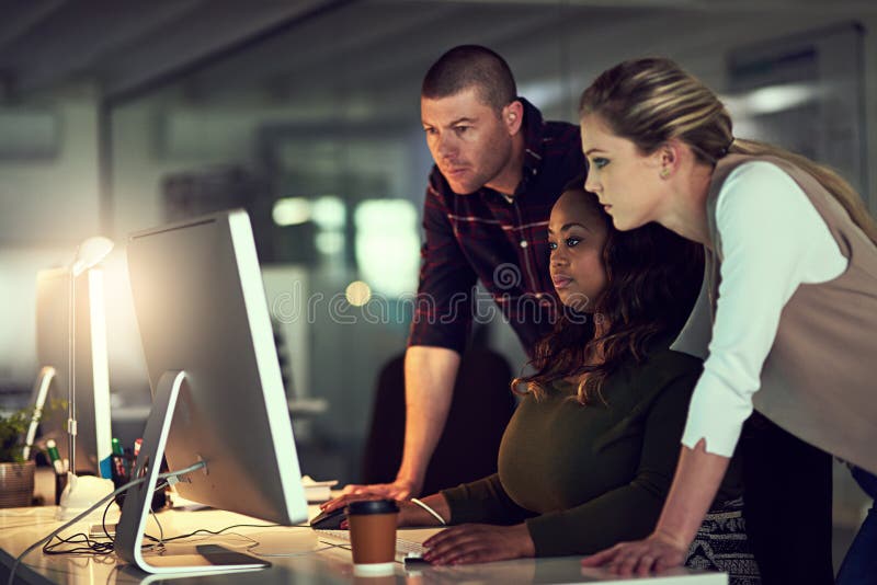 This Project Has Our Full Attention. a Group of Work Colleagues Working ...