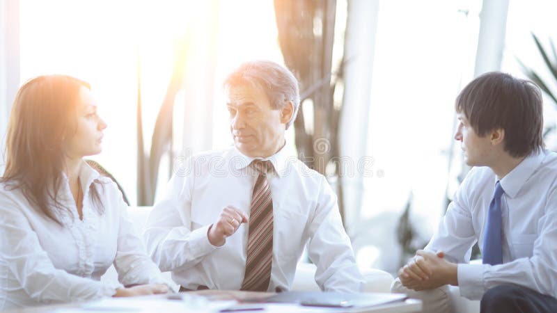 Project Leader Talking To Business Team in the Workplace. Stock Photo ... Project Leader Talking To Business Team in the Workplace. Stock Photo ...