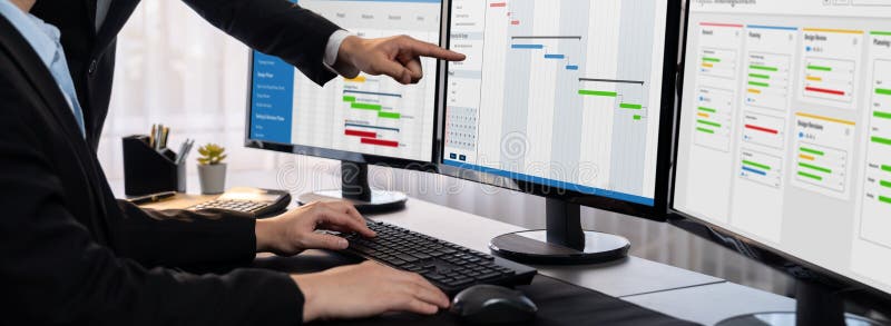 Business People Planning Time and Deadline for Company Task ...