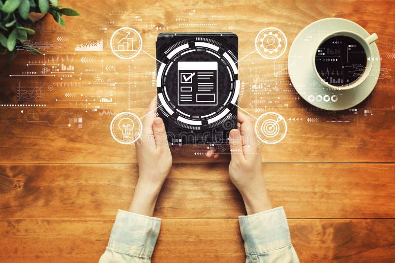 Project Management Theme with a Person Holding a Tablet Stock Photo ...