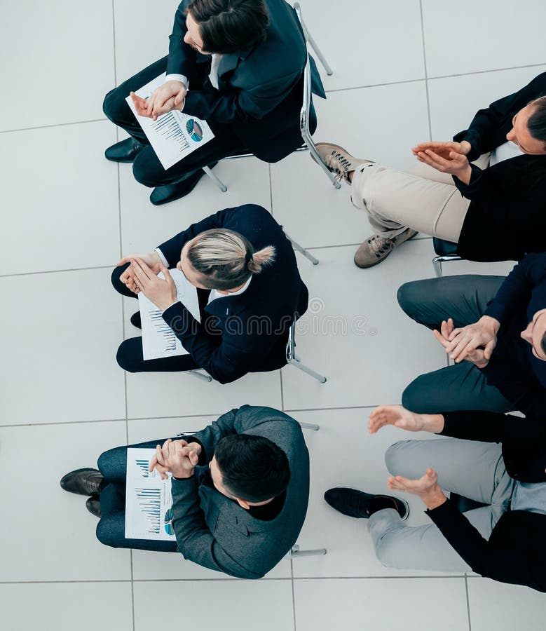 Project Manager Asking Questions at a Meeting with the Working Group ...