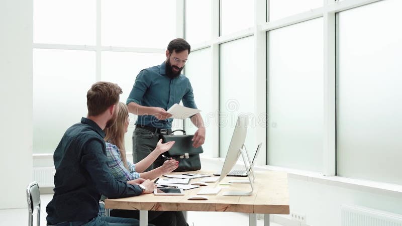 Project Manager Communicating with Employees in the Workplace. Stock ...