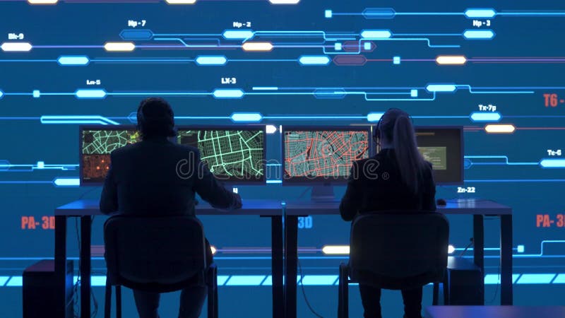 Technical Support in Control Room. it Specialists in Headsets Work on ...