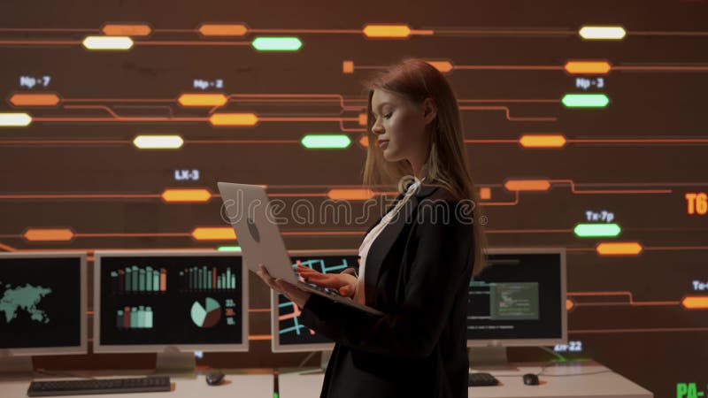 It Specialist Monitoring Network Traffic in System Control Room Stock ...