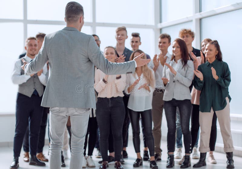 Project Manager and a Group of Young Professionals Standing in the ...
