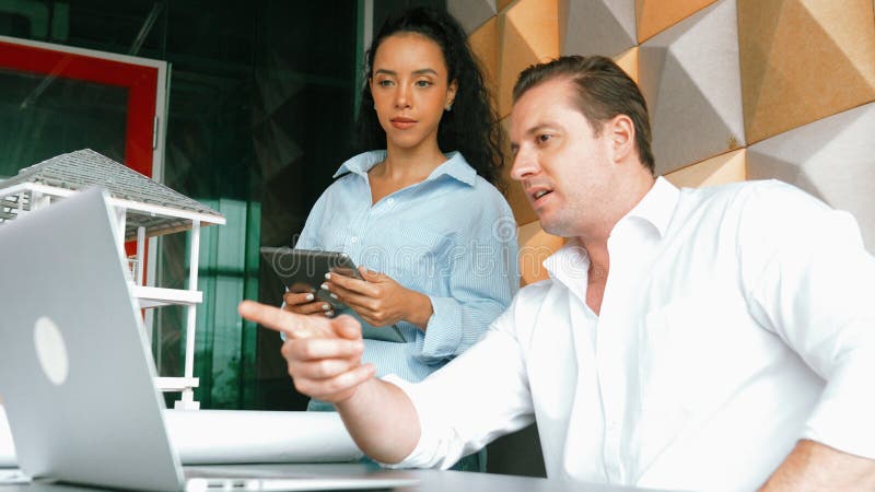 Project Manager Pointing and Discussion about Building Design ...