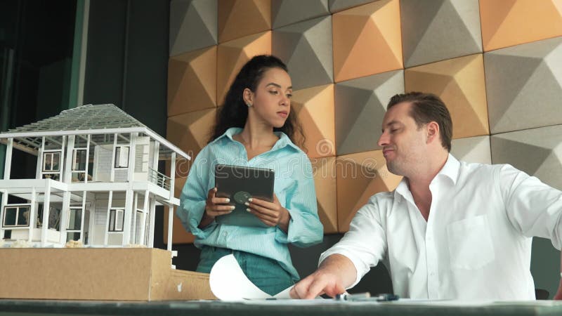 Project Manager Pointing and Discussion about Building Design ...