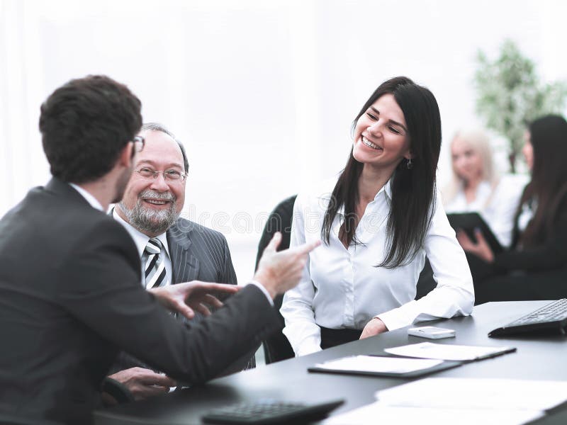 Project Manager and Staff Talking at the Desk Stock Image - Image of ...