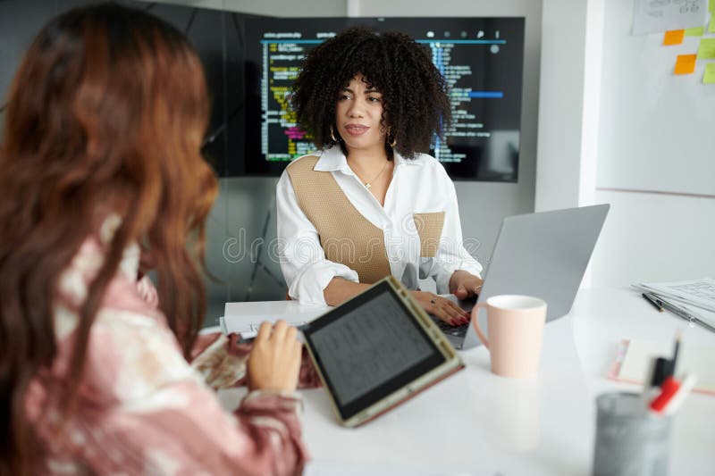 Project Manager Talking To Designer Stock Image - Image of project ...