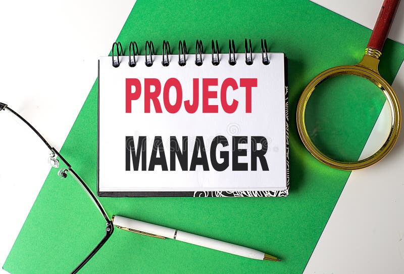 PROJECT MANAGER Text on Notebook on Green Paper Stock Image - Image of ...
