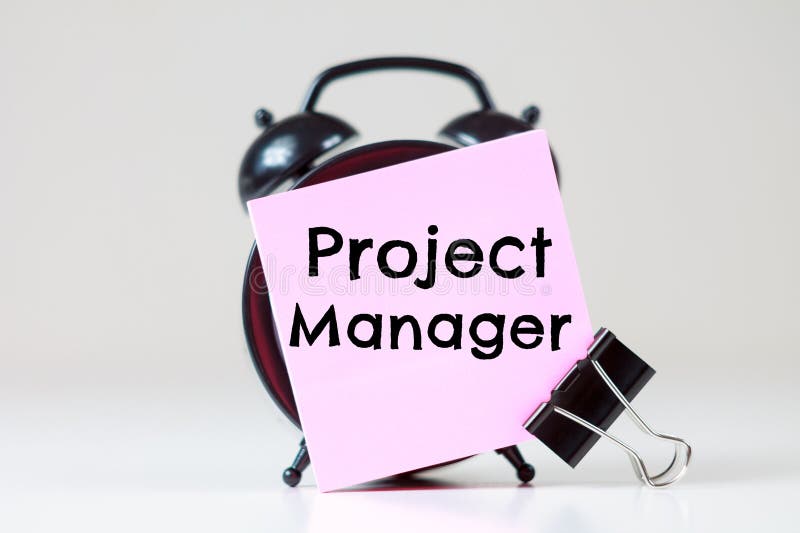 Project Manager Text on a Sticker for Reminders with an Alarm Clock ...