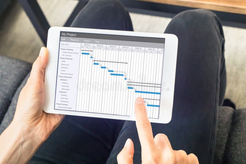 Project Manager Updating Gantt Chart Schedule, Planning Software ...