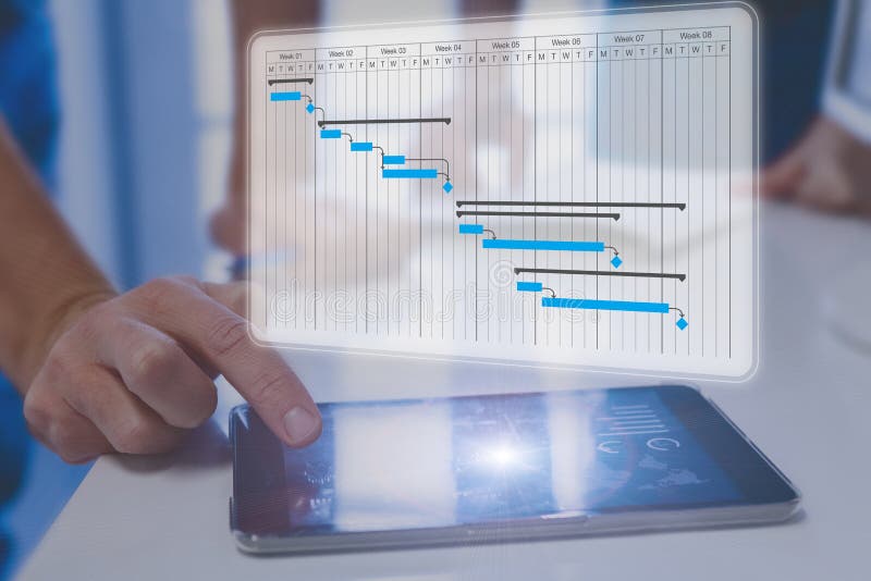 Project Manager Working with Gantt Chart Schedule To Plan Tasks and ...