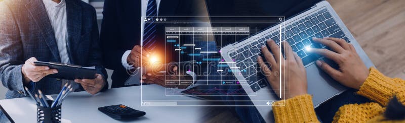 Project Manager Working with Gantt Chart Schedule To Plan Tasks and ... Project Manager Working with Gantt Chart Schedule To Plan Tasks and ...