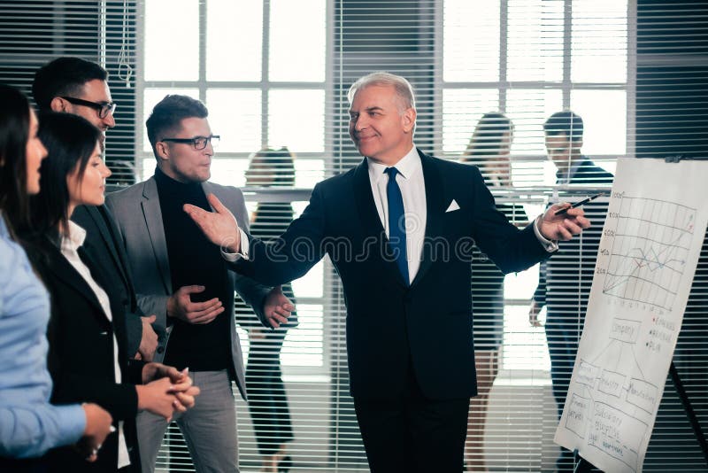 Project Manager and Working Group Standing in the Conference Room ...