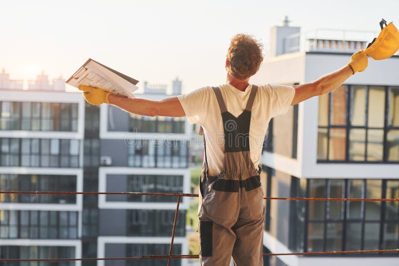 Project Manager. Young Man Working in Uniform at Construction at ...