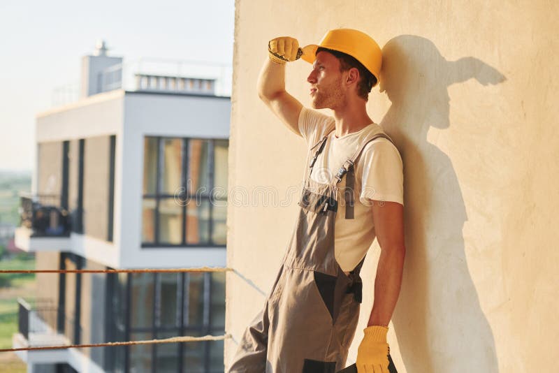 Project Manager. Young Man Working in Uniform at Construction at ...
