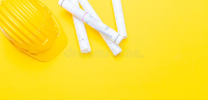 Project Paper Blueprints and Hard Hat on Yellow Color Background, Copy ...
